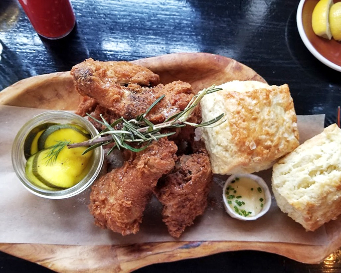 Golden-brown perfection that makes you understand why people drive for hours. This fried chicken's audible crunch should have its own soundtrack album.