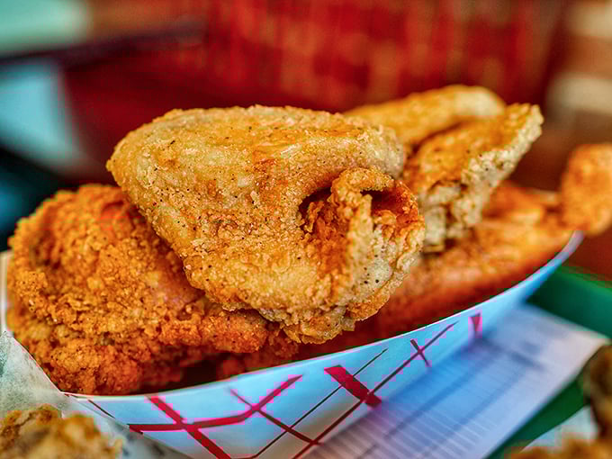Golden-brown perfection that makes you want to break all your diet promises. This chicken's crackling exterior gives way to juicy meat that's worth every napkin.