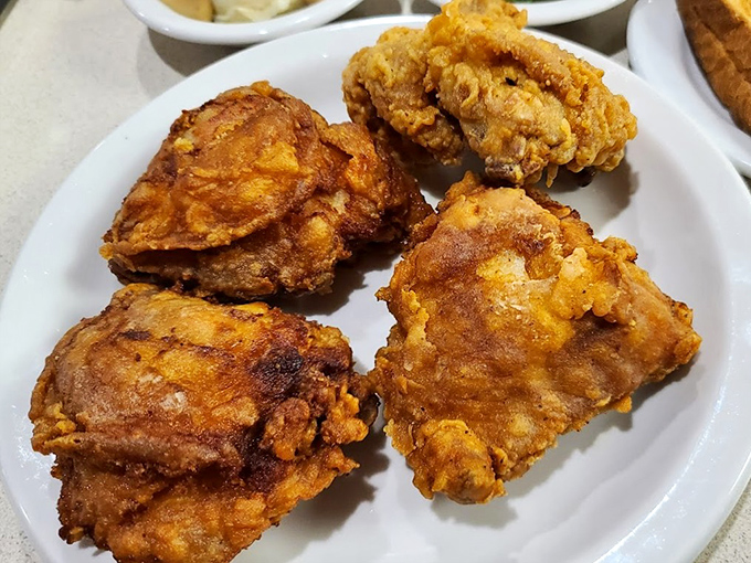 Golden-brown perfection that makes you understand why people cross county lines for fried chicken. That crunch should have its own soundtrack.