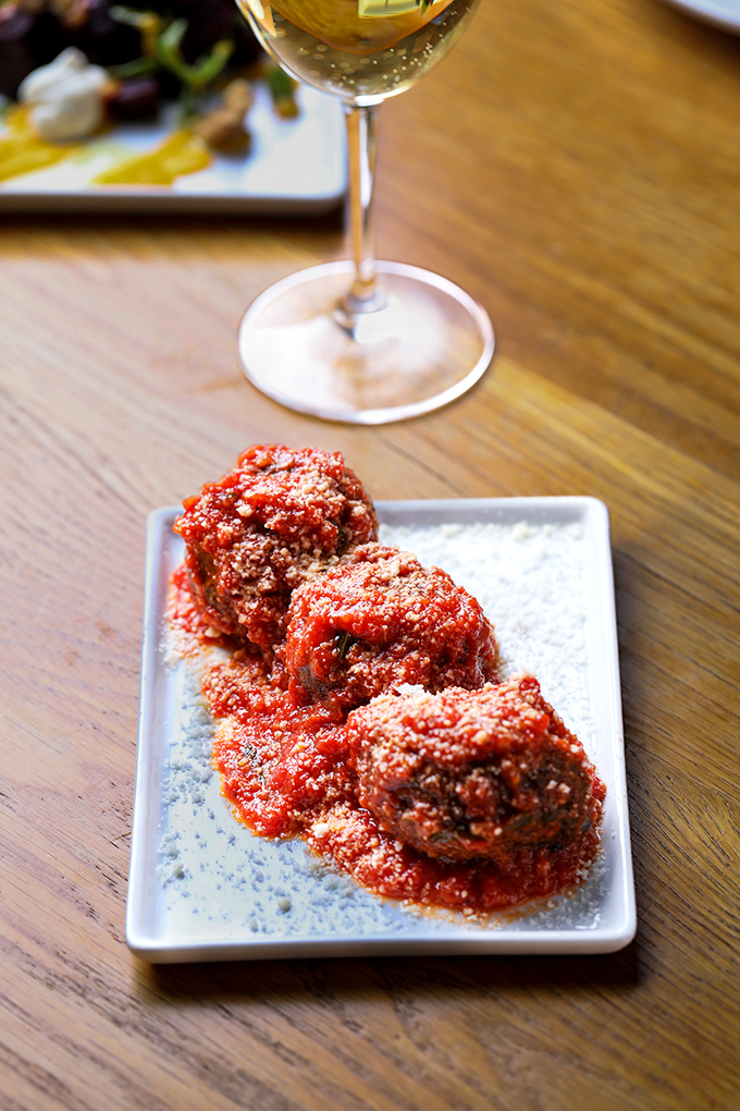 These aren't your nonna's meatballs&mdash;they're better. Crispy exterior, tender interior, and that sauce? Forget about it!