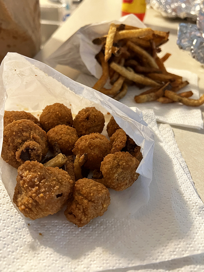 Golden-brown perfection in every bite. These aren't just fried mushrooms; they're little umami bombs that could make a vegetable-hater reconsider their life choices.
