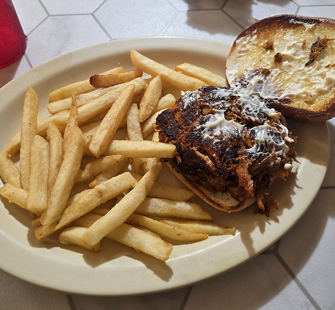 This pulled pork sandwich isn't trying to impress food critics &ndash; it's too busy making regular folks swoon with delight.