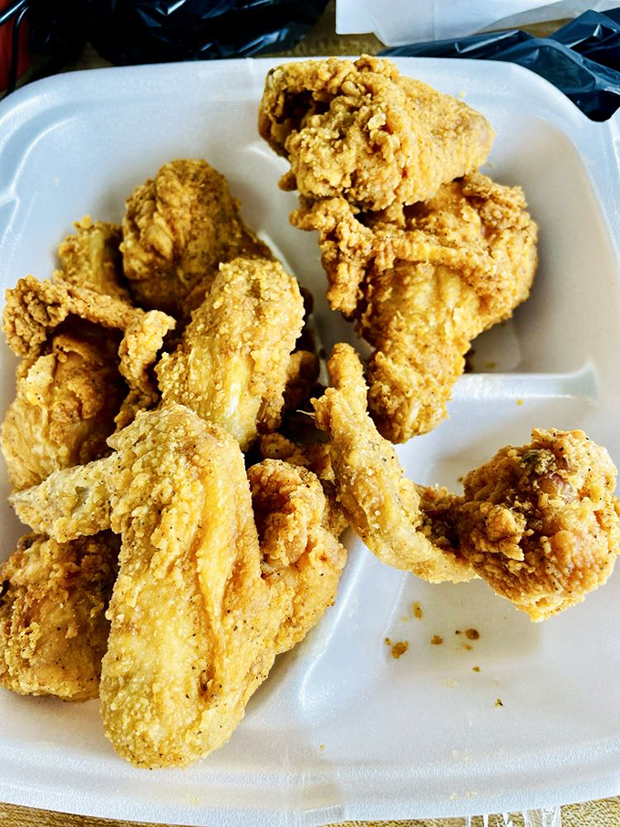 Golden-brown perfection that makes you want to slap your mama (but don't, she probably taught someone how to fry chicken this good).