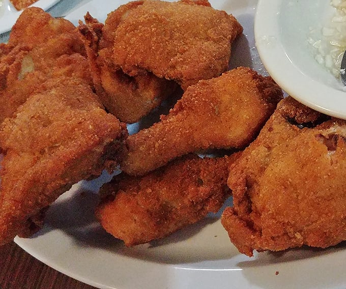 Golden-brown perfection that makes Colonel Sanders look like an amateur. This Barberton-style fried chicken delivers a crunch you can hear three tables away.