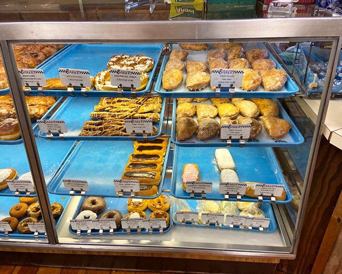 Blue trays loaded with golden treasures await behind glass&mdash;like a museum exhibit dedicated to the art of "How to Make People Happy."