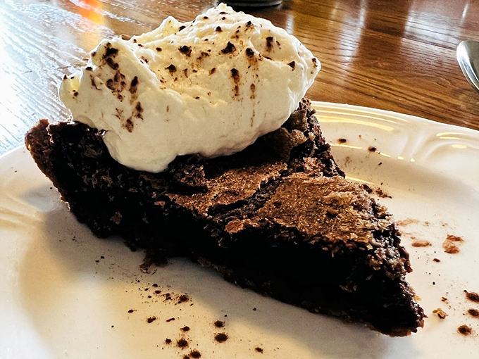 The legendary fudge pie&mdash;a chocolate revelation with that perfect crackly top and cloud of whiskey-kissed whipped cream. Worth every mile of the drive.