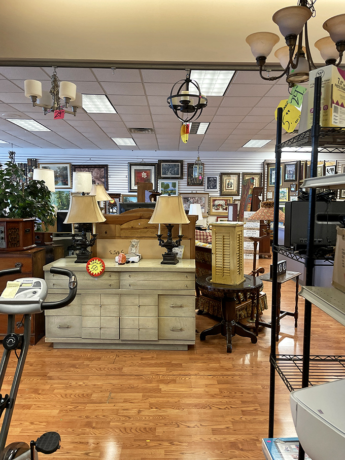 Furniture heaven awaits with lamps, dressers, and decor arranged like a homey department store. That dresser with matching lamps? Someone's living room is about to get a makeover.