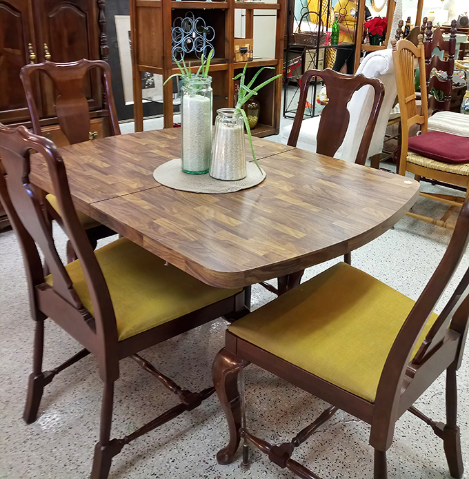 This dining set isn't just furniture—it's a time machine to family dinners circa 1965, mustard-colored seat cushions included.