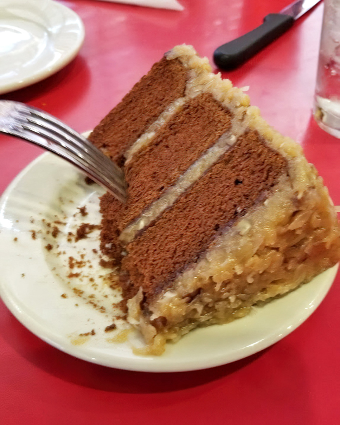 Three layers of chocolate divinity crowned with that coconut-pecan frosting that would make your German grandmother weep with joy.