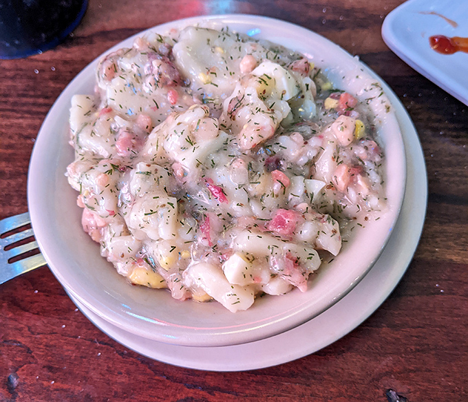 German potato salad that would make your Oma weep with joy&mdash;creamy, tangy perfection studded with bacon bits that add little flavor explosions in every bite.