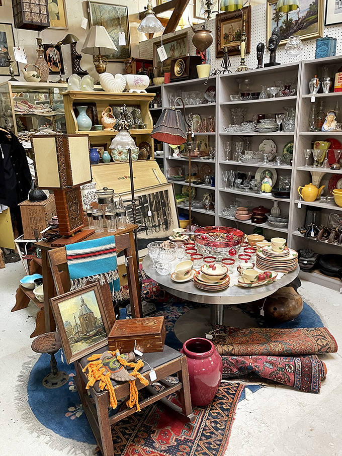 A collector's fever dream of glassware, ceramics, and curios. Every surface tells a different story from a different decade.