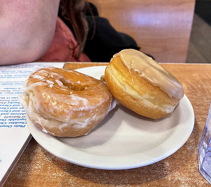 These glazed beauties aren't just donuts &ndash; they're edible sunshine with a side of childhood nostalgia. Worth every sticky finger.