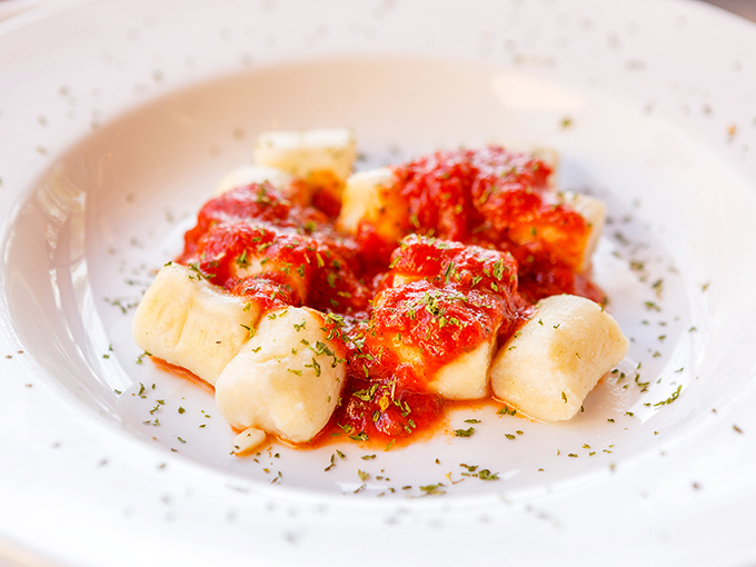 Pillowy gnocchi swimming in vibrant marinara sauce&mdash;this isn't just pasta, it's a cloud-like potato revelation that would make any Italian grandmother weep with joy.