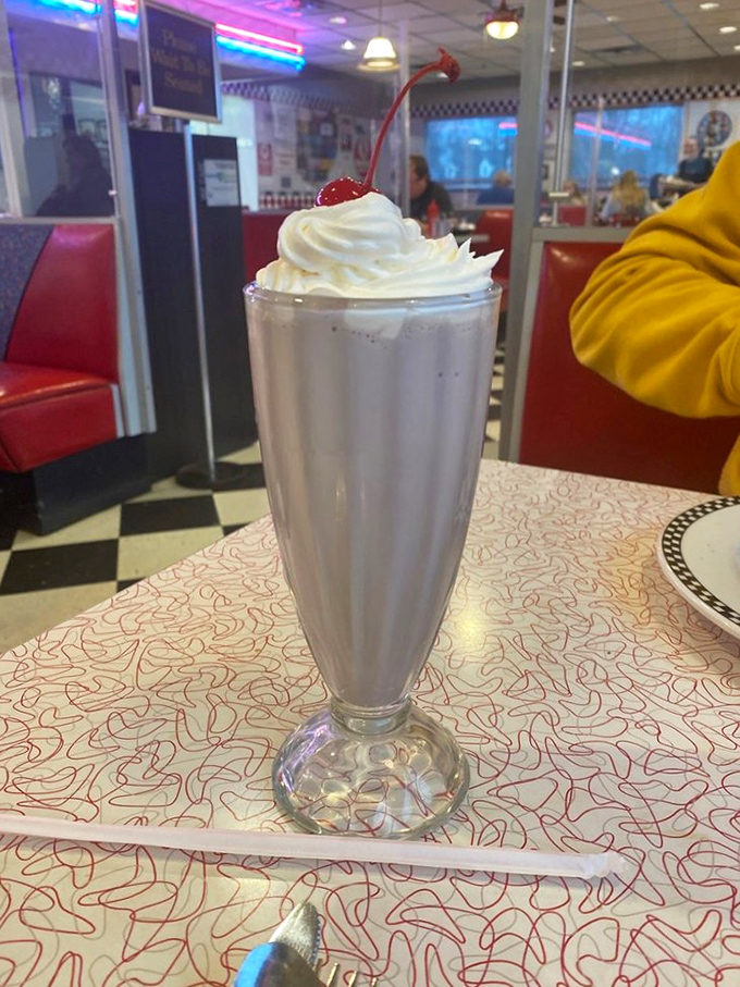 Cloud-like whipped cream crowned with a cherry&mdash;this milkshake isn't just thick enough for a spoon, it's practically a national monument to dairy.