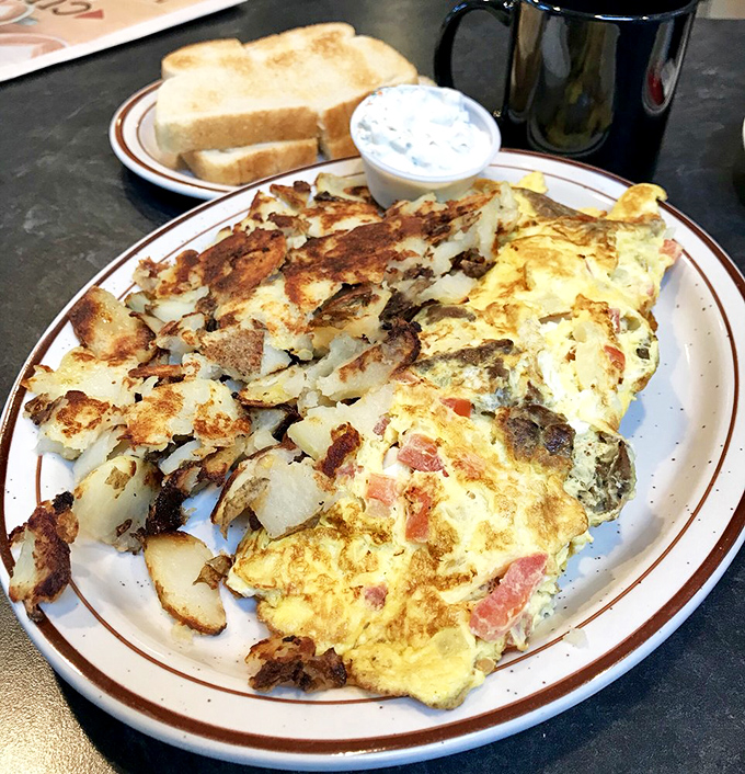 Breakfast nirvana on a plate! This omelet doesn't just satisfy hunger&mdash;it creates the kind of morning memory that has you planning your next visit.