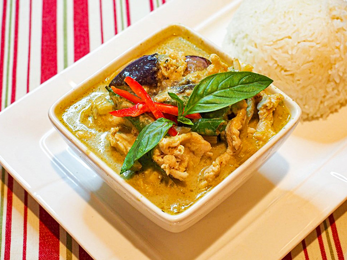 The green curry &ndash; creamy, aromatic, and adorned with fresh basil and red chili &ndash; is the kind of dish you'll dream about at random moments.