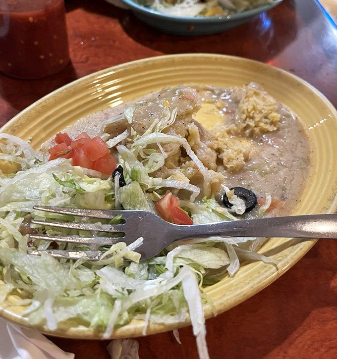 This green corn tamale doesn't just sit on the plate&mdash;it beckons with its comforting embrace of masa and fresh ingredients. Comfort food that speaks Spanish.