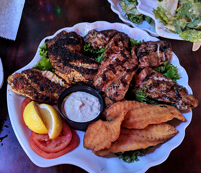 Blackened to perfection, this grouper platter doesn't just satisfy hunger&mdash;it creates memories. The char marks are like flavor roadmaps leading to seafood nirvana.