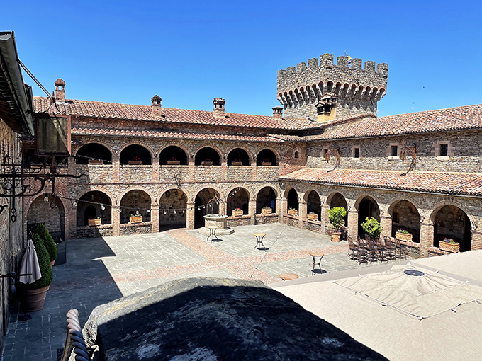 The courtyard whispers centuries of imagined history, its arched walkways and stone columns creating the perfect backdrop for your "I bought a castle" selfie.