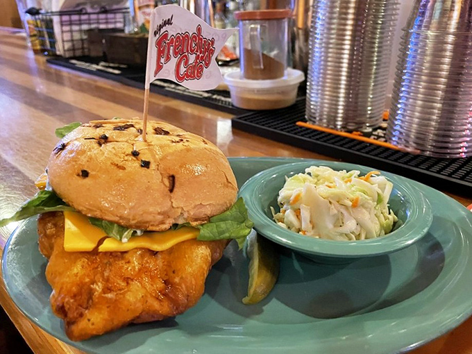 The grouper sandwich arrives looking like it could double as a life preserver &ndash; crispy, golden, and absolutely massive.