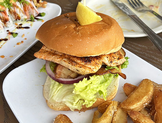 Behold the star of the show&mdash;a grouper sandwich that makes other fish sandwiches look like they're not even trying. That lemon wedge isn't garnish, it's essential equipment.
