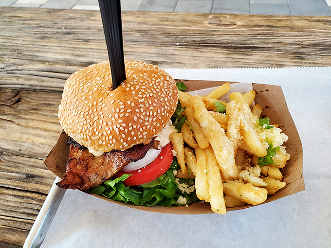 This isn't just a sandwich; it's Florida on a bun. Golden-fried grouper, fresh toppings, and fries that make you question why you'd ever eat anything else.