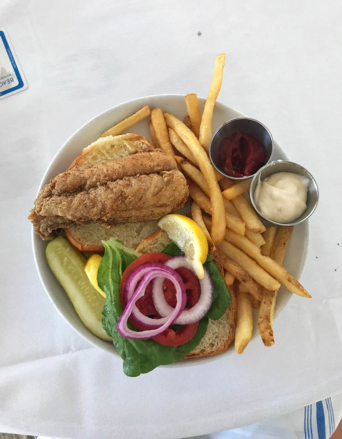 The holy grail of Florida sandwiches doesn't need fancy packaging. Just perfectly fried grouper, fresh toppings, and the willpower not to inhale it.