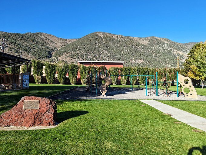 Small-town charm extends to Gus Hess Community Park, where retirement means having time to watch grandkids play against a backdrop of million-year-old mountains.