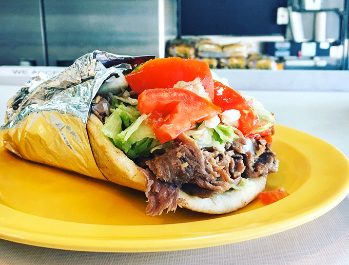 The legendary gyro in all its glory. Seasoned meat, fresh veggies, and tzatziki sauce create a handheld masterpiece worth crossing county lines for.