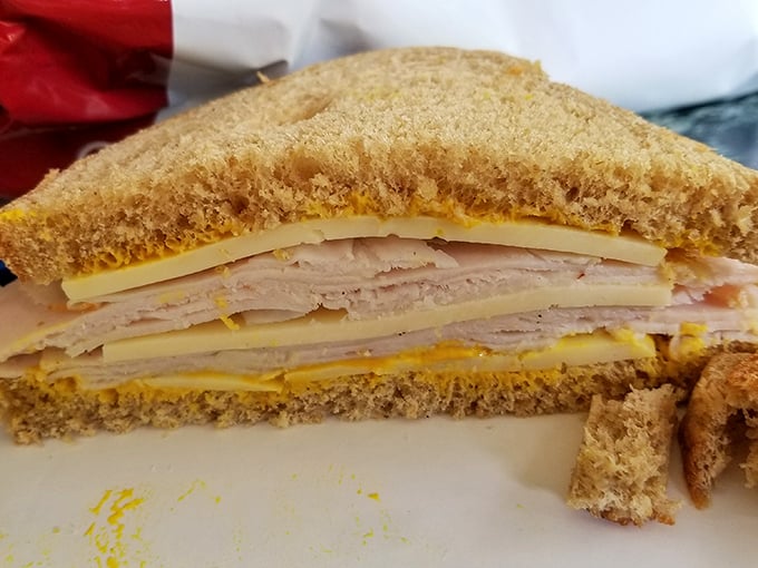 Layer upon layer of thinly sliced ham and cheese create the architectural marvel known as the perfect sandwich. Simplicity elevated to art form.