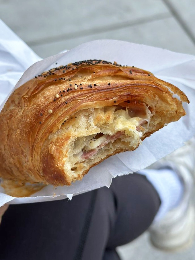 The star of the show: layers upon buttery layers cradling perfect ham and cheese. This isn't just breakfast&mdash;it's edible architecture that happens to taste like heaven.