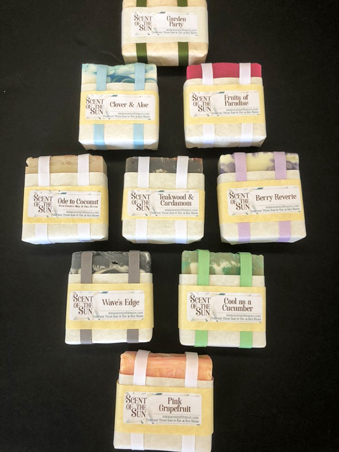 "Scent of the Sun" artisanal soaps lined up like edible treats—the kind of bathroom upgrade that makes guests secretly snoop in your medicine cabinet.