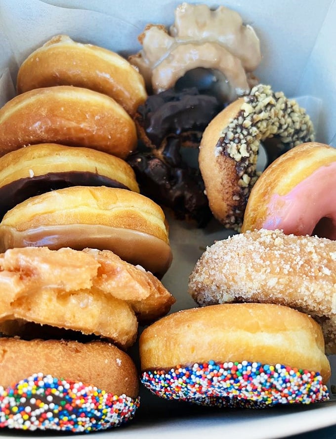 Donut heaven exists, and it's this box. The sprinkled ones are practically winking at you, saying "diet plans are overrated anyway."