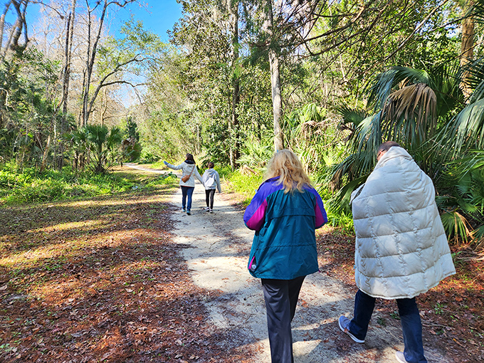 Nature trails wind through lush Florida wilderness, offering retirees the perfect balance of gentle exercise and wild beauty just minutes from downtown. 