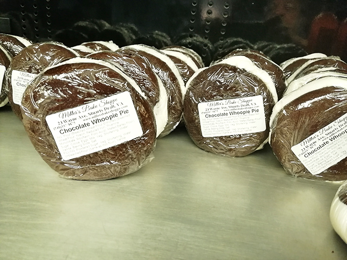 These chocolate whoopie pies are basically happiness sandwiched between two perfectly soft, cake-like cookies that melt hearts.