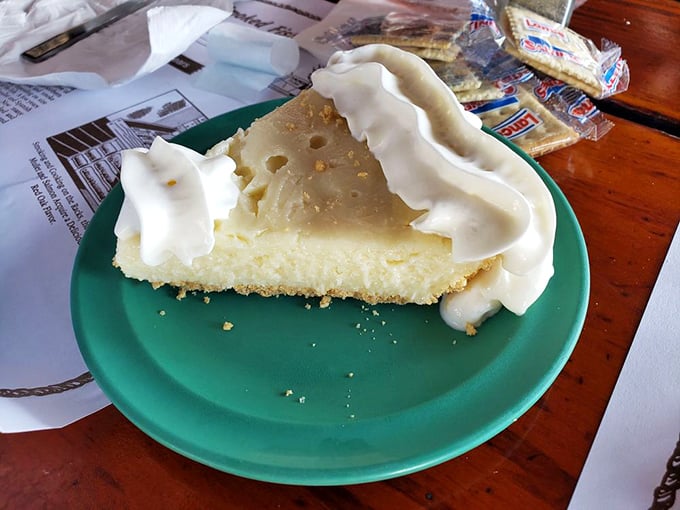 This cream pie isn't just dessert; it's an edible cloud with a crust. The kind of slice that makes you consider ordering a second before finishing the first.