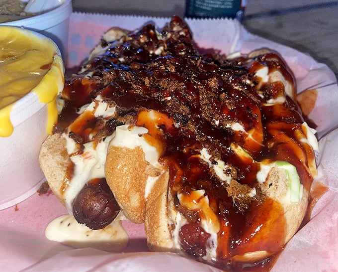 The legendary hot dog that launched a thousand road trips. Topped with slaw and sauce, it's proof that greatness often comes in simple packages.