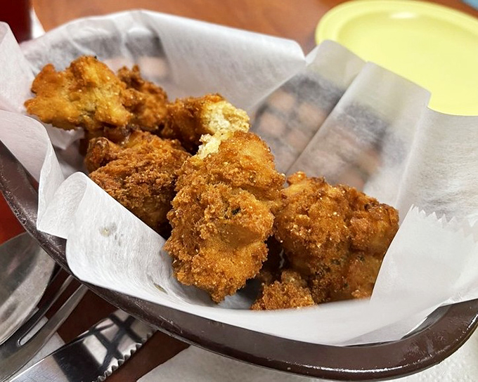 These golden orbs of fried perfection could broker world peace, one crispy bite at a time.