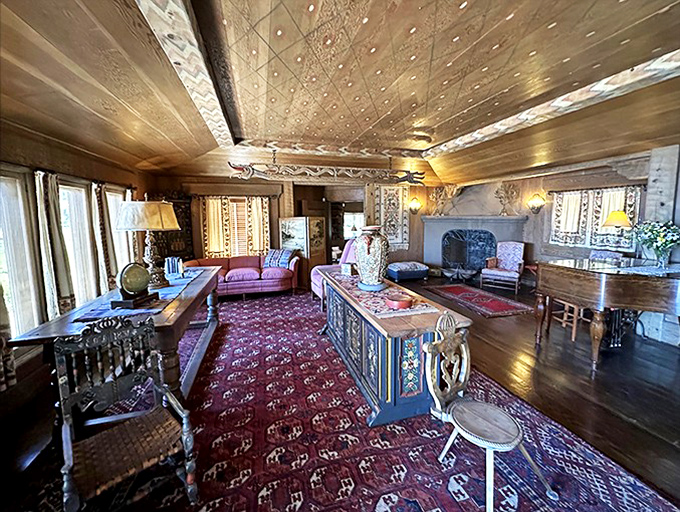 Living room fit for Norse royalty. The hand-painted ceiling and authentic furnishings make you half-expect a Viking to walk in and offer you some mead.