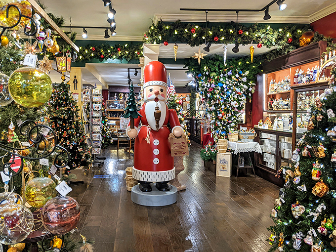 Inside, a life-sized nutcracker stands guard over a wonderland of ornaments and greenery. Santa's German cousin, perhaps?
