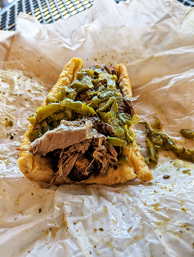 Behold the star attraction: thinly sliced beef, sweet peppers, and bread that's surrendered completely to the savory jus. Napkins required, not optional.