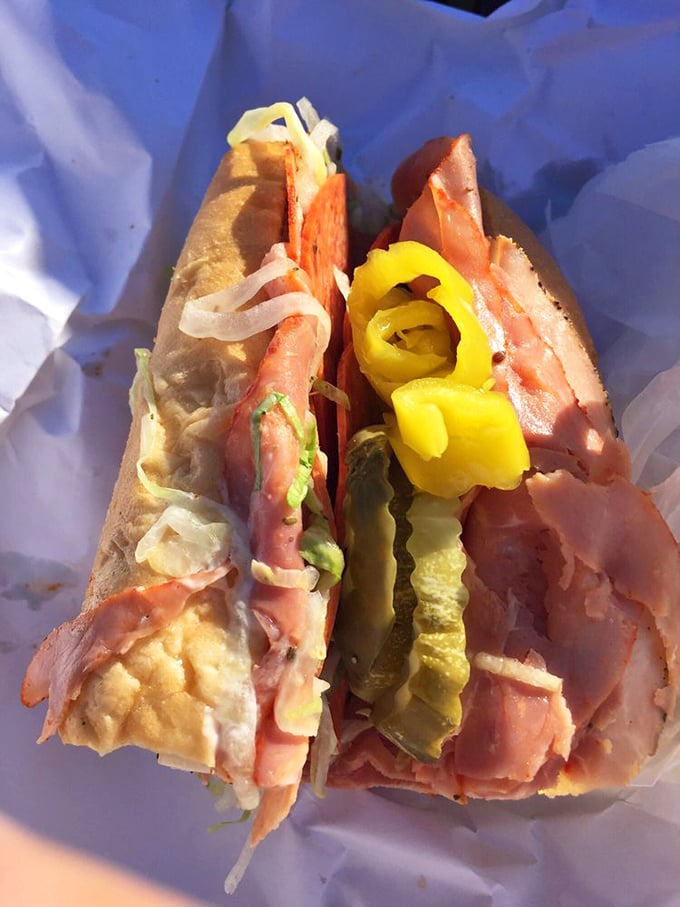 Not all heroes wear capes; some come wrapped in paper with layers of Italian meats, provolone, and perfectly dressed veggies.