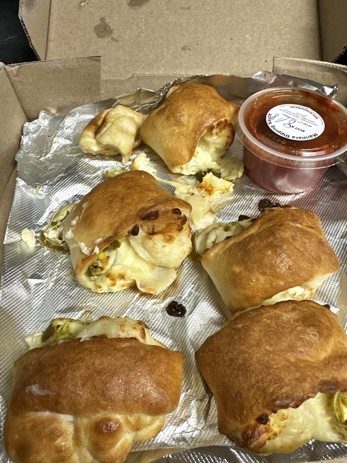 Golden-brown calzone pockets burst with molten cheese and fillings. These hand-held flavor bombs make you wonder why you ever bothered with regular pizza.