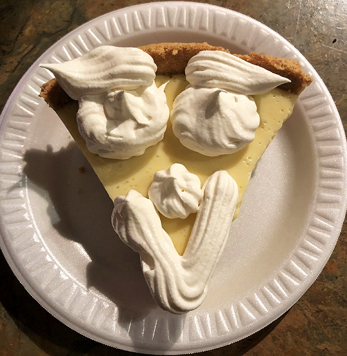 Key lime pie with whipped cream swirls that dance across the plate. Florida sunshine transformed into dessert form.