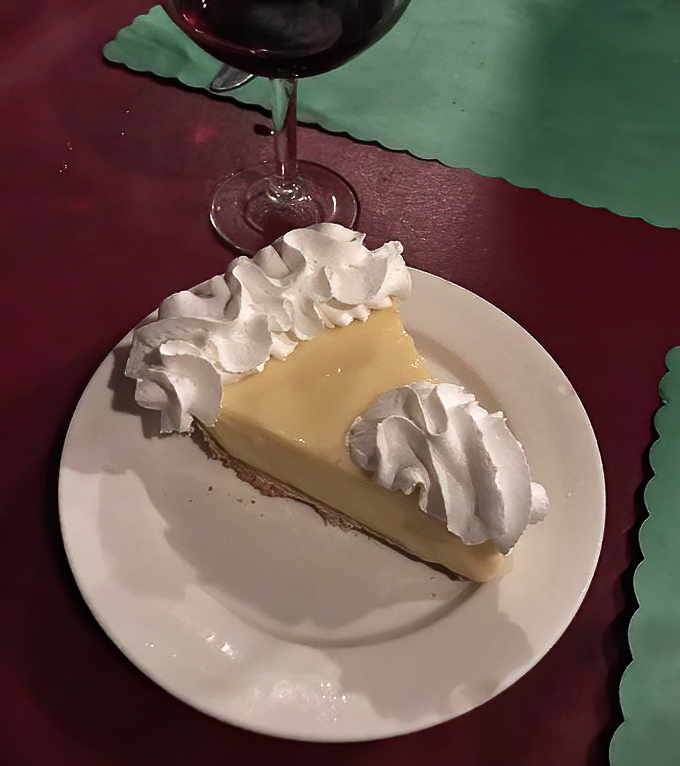 The legendary Key lime pie arrives with perfect proportions&mdash;tangy custard balanced by a cloud of whipped cream atop a graham cracker foundation.