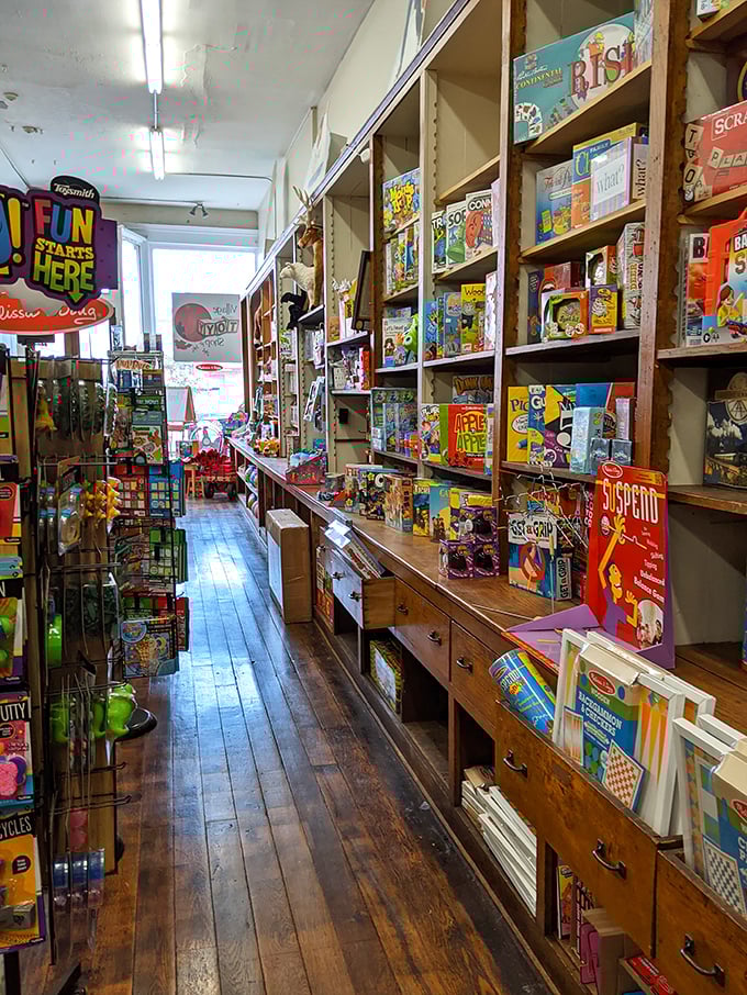 Remember when toys sparked imagination instead of requiring batteries? This colorful aisle is childhood joy preserved in three dimensions.