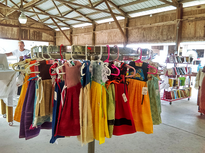 A rainbow of possibilities hanging in perfect formation. Each tiny dress holds the promise of "remember when she wore this?" photos for years to come.