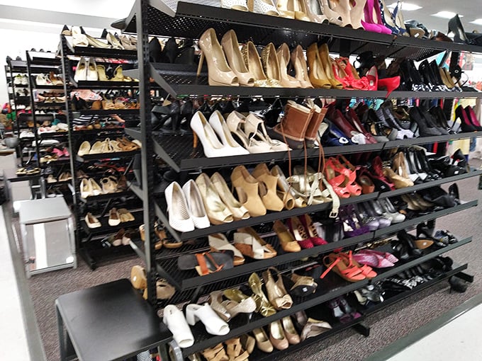 Cinderella had one fairy godmother; you've got an entire wall of glass slippers. Designer heels and practical flats living together in secondhand harmony.