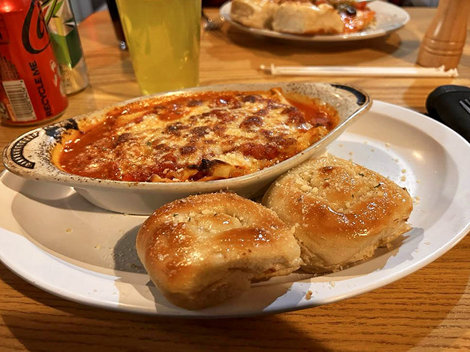 Behold the bubbling masterpiece that launched a thousand return visits&mdash;layers of pasta, cheese, and sauce that would make any Italian grandmother nod in silent approval.