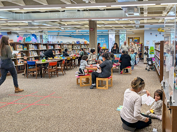 The library buzzes with multi-generational activity. Where else can you get unlimited entertainment without touching your Social Security check?